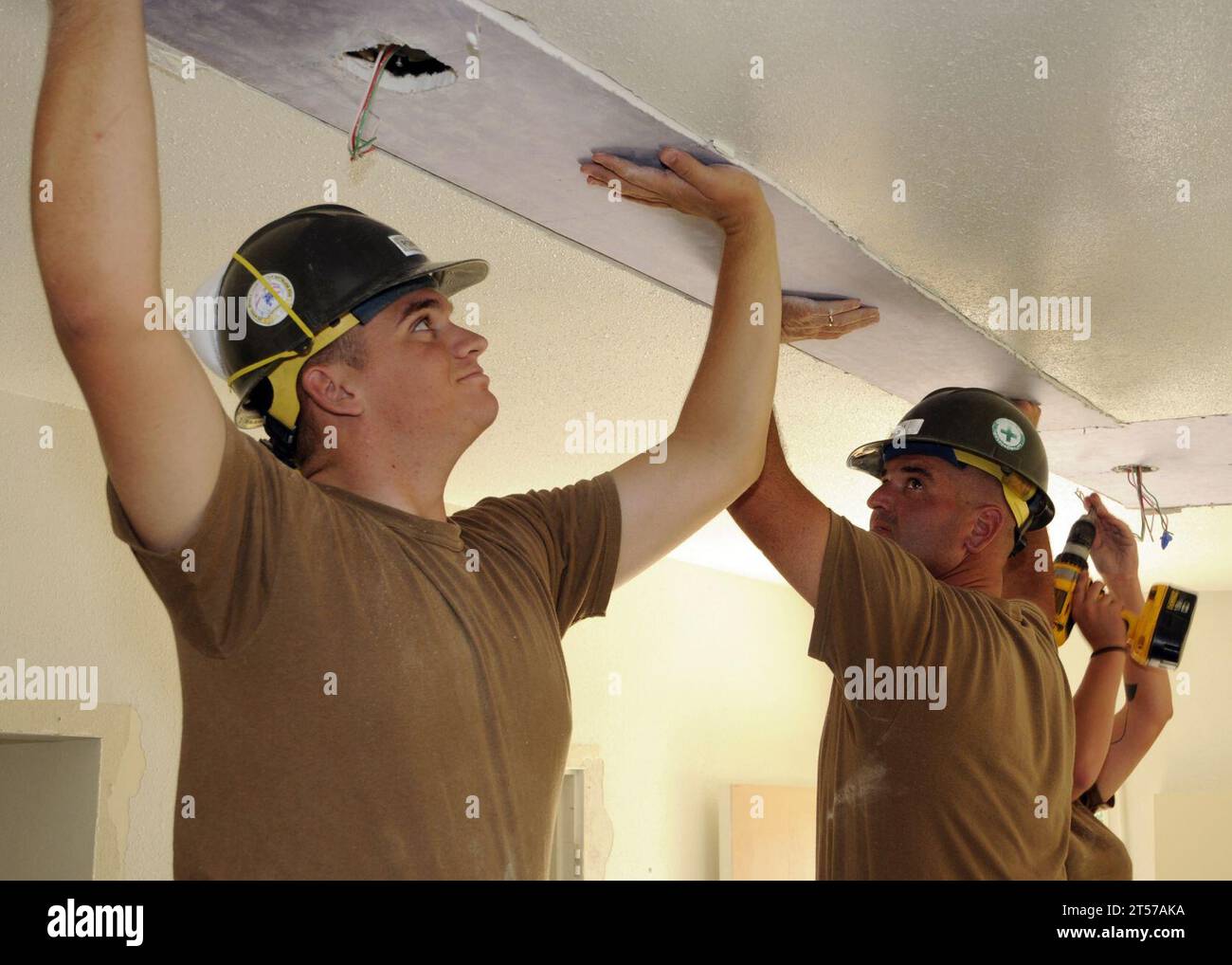 US Navy Seabees from Naval Mobile Construction Battalion (NMCB) 5 work ...