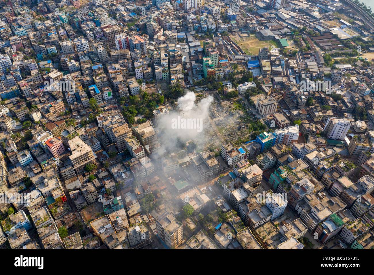 Dhaka, Bangladesh. Aerial view of Dhaka, the Capital of Bangladesh, shows smoke of a fire ...