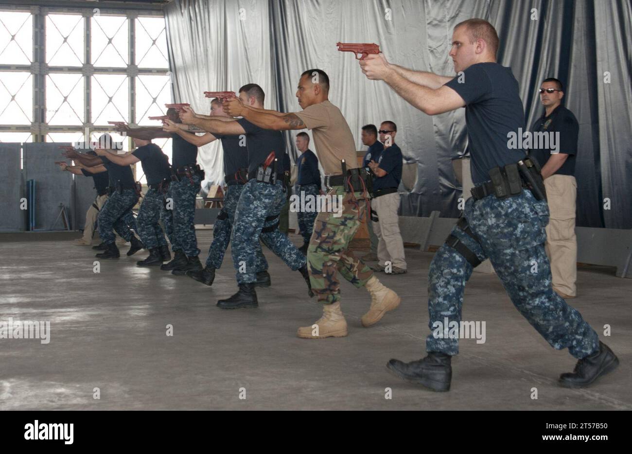 US Navy Students attending the 15-day Security Reaction Force-Basic (SRF-B) training session ...