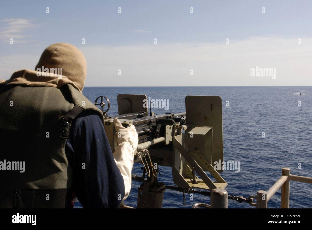 US Navy takes aim on a contact posing as a threat with a .50 cal ...