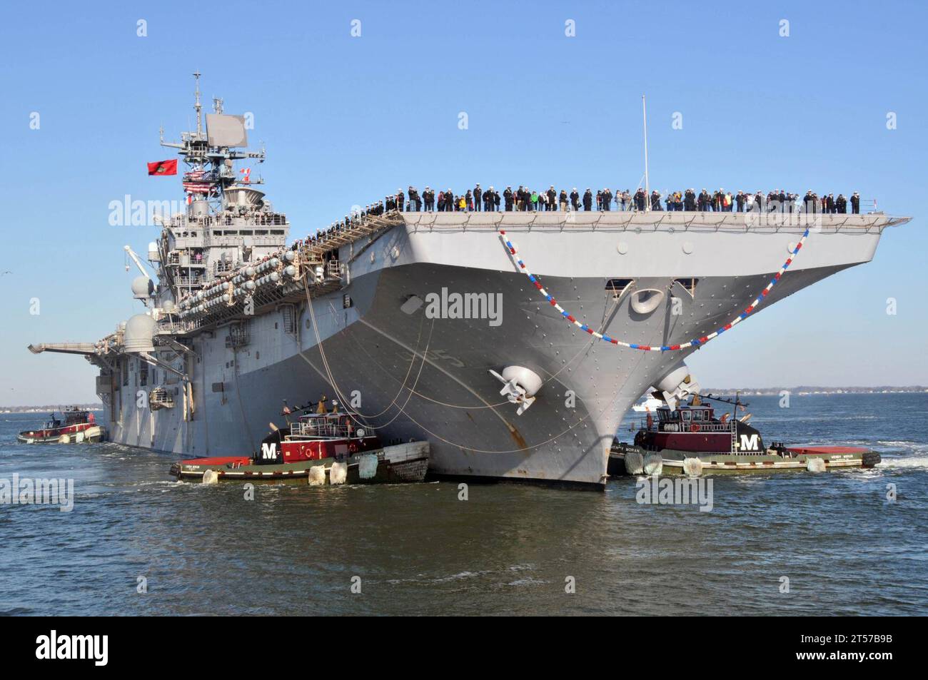 US Navy The amphibious assault ship USS Bataan (LHD 5) pulls into Naval ...