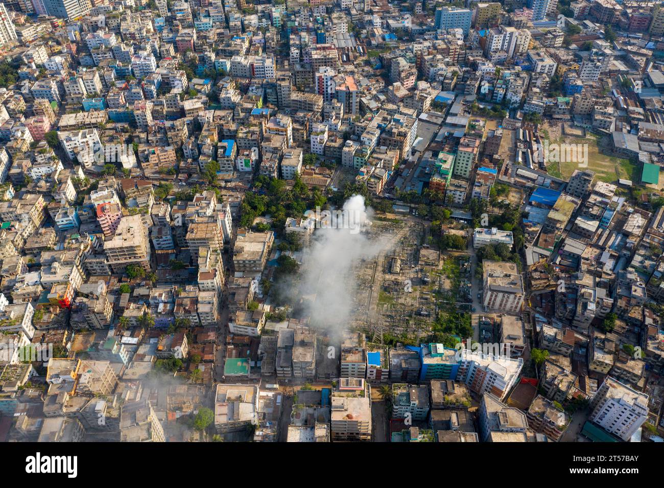 Dhaka, Bangladesh. Aerial view of Dhaka, the Capital of Bangladesh, shows smoke of a fire ...