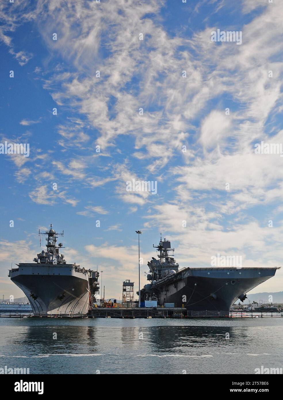 US Navy The amphibious assault ships USS Peleliu (LHA 5), left, and USS ...