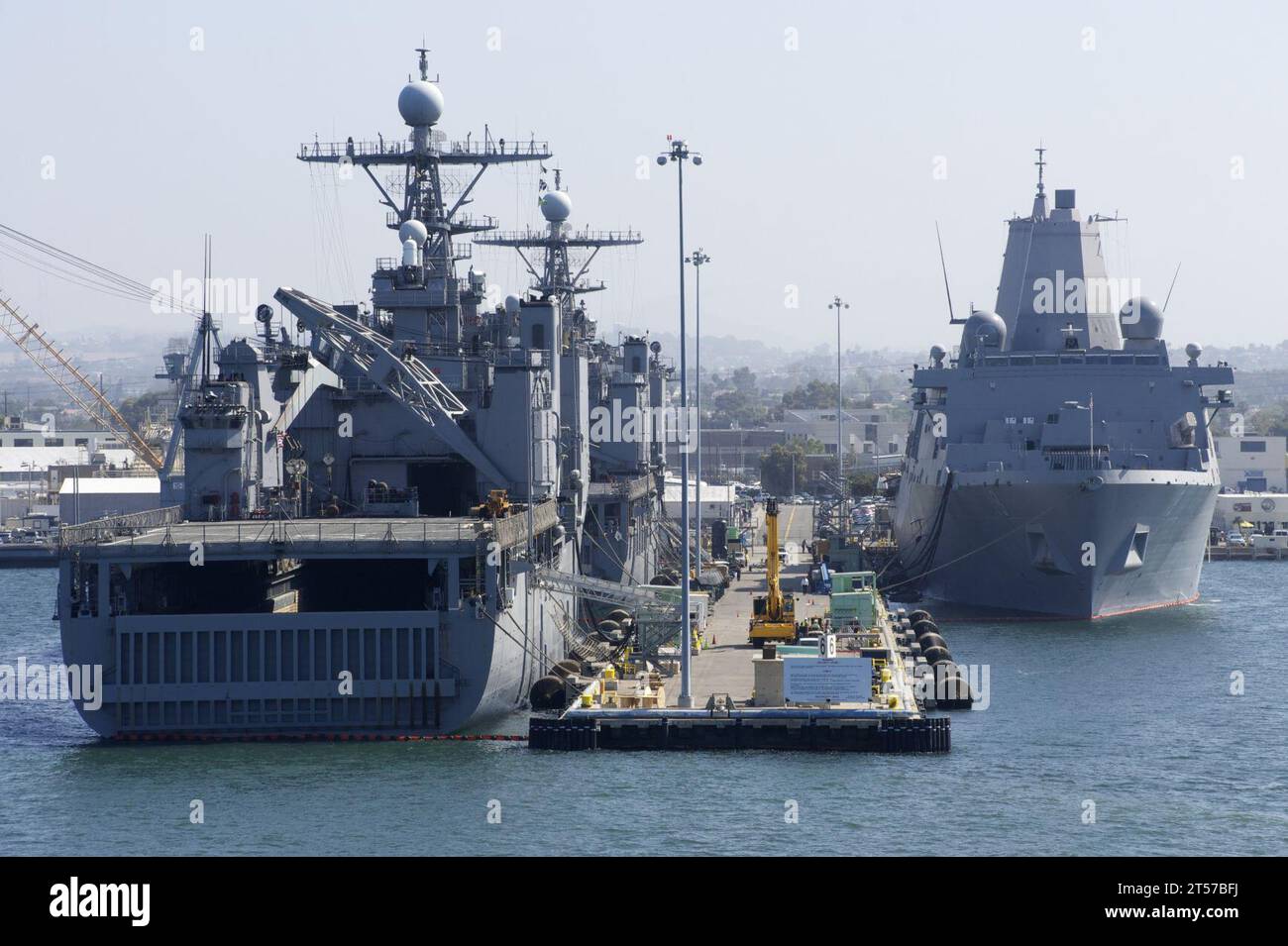 US Navy The amphibious dock landing ships USS Pearl Harbor (LSD 52) and ...