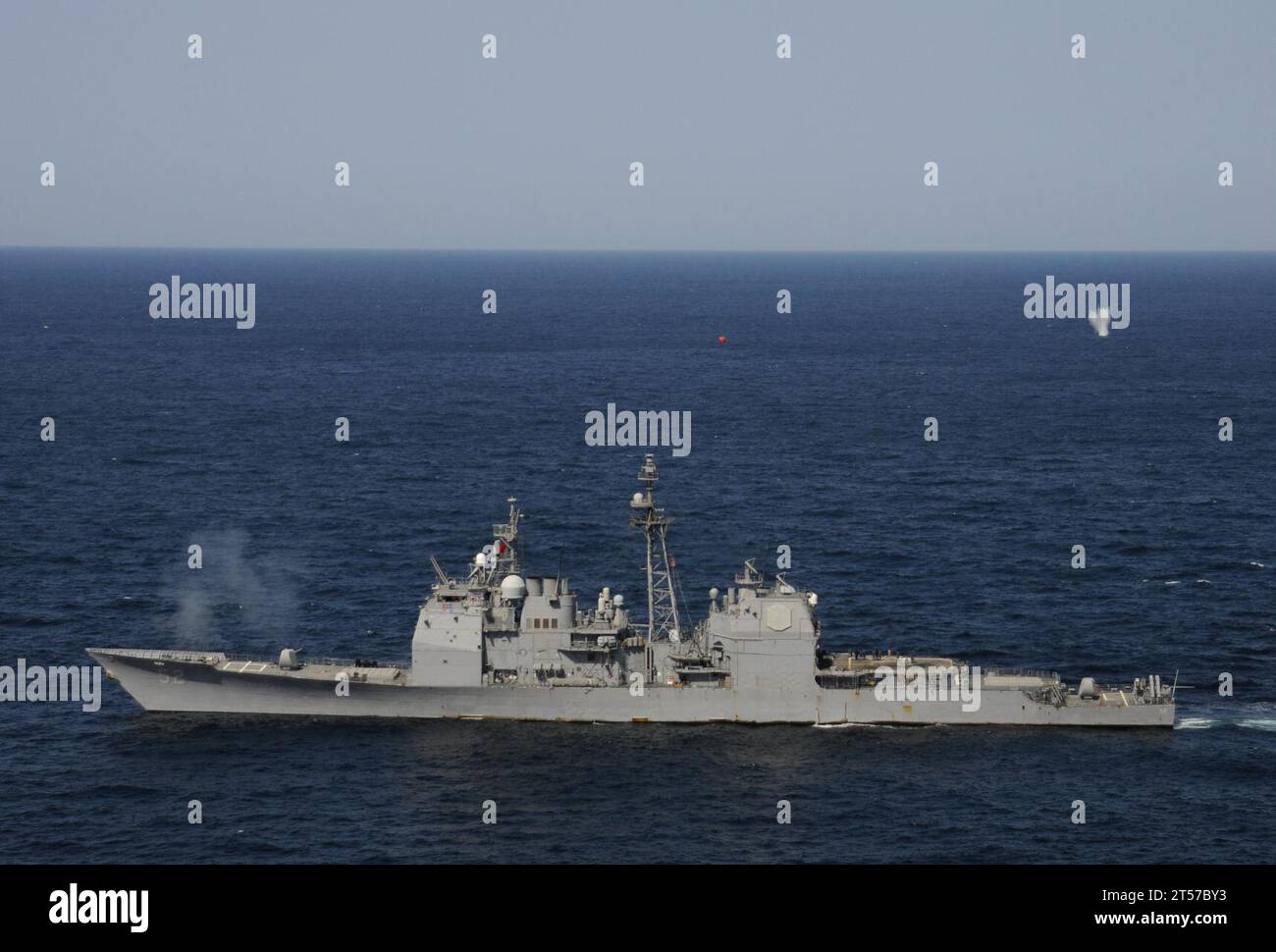 US Navy The guided-missile cruiser USS Bunker Hill (CG 52) fires an MK ...