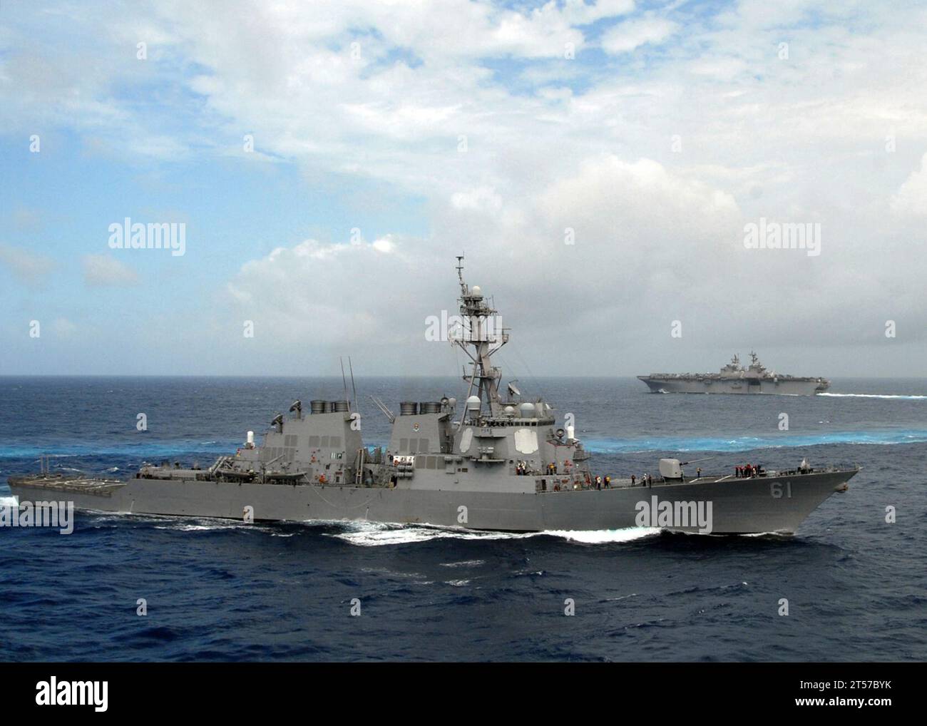 US Navy The guided-missile destroyer USS Ramage (DDG 61) and the multi ...