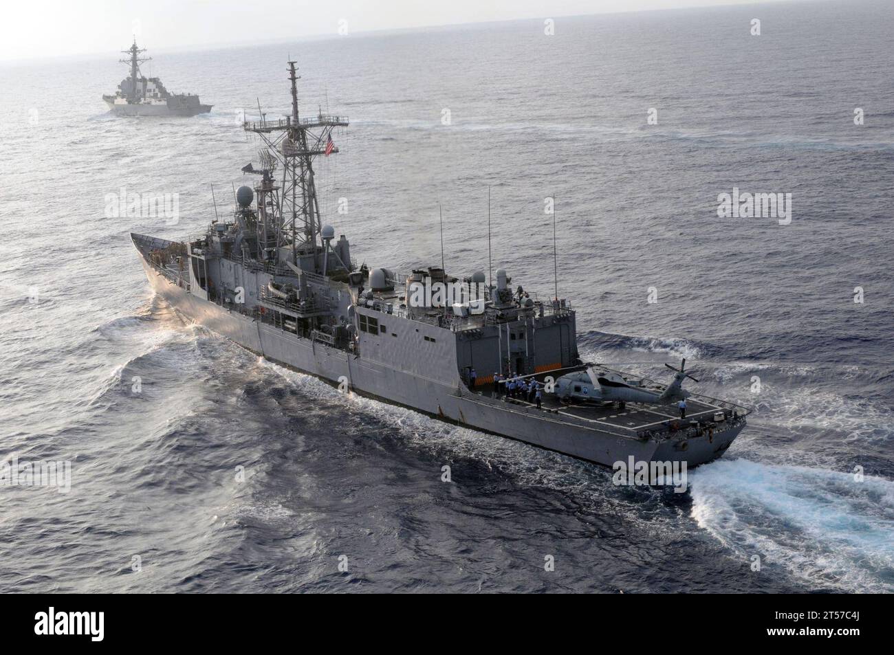 US Navy The guided-missile frigate USS Thach (FFG 43) steams toward the ...