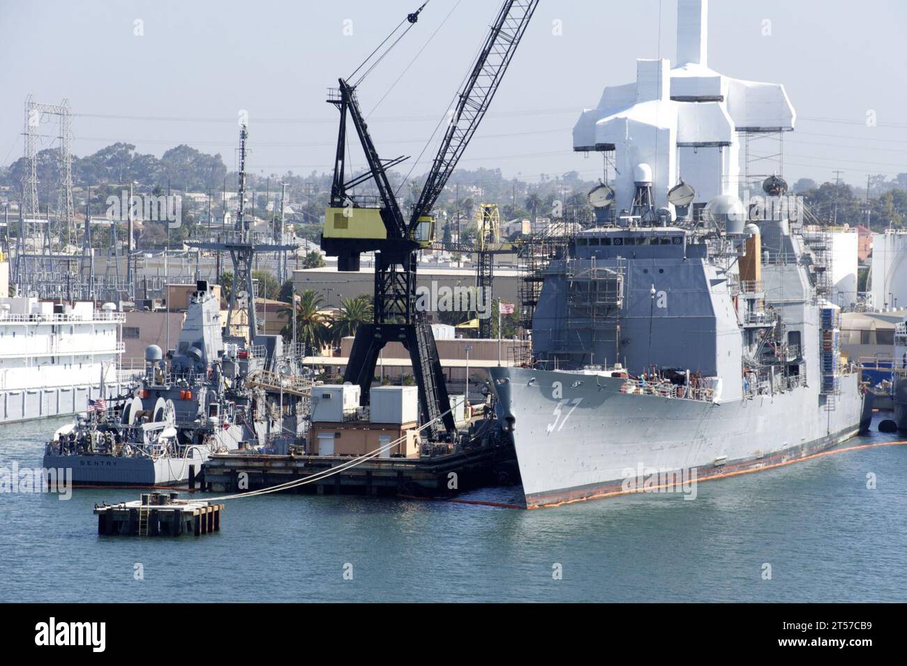 US Navy The mine countermeasures ship USS Sentry (MCM 3) and the guided-missile cruiser USS Lake ...
