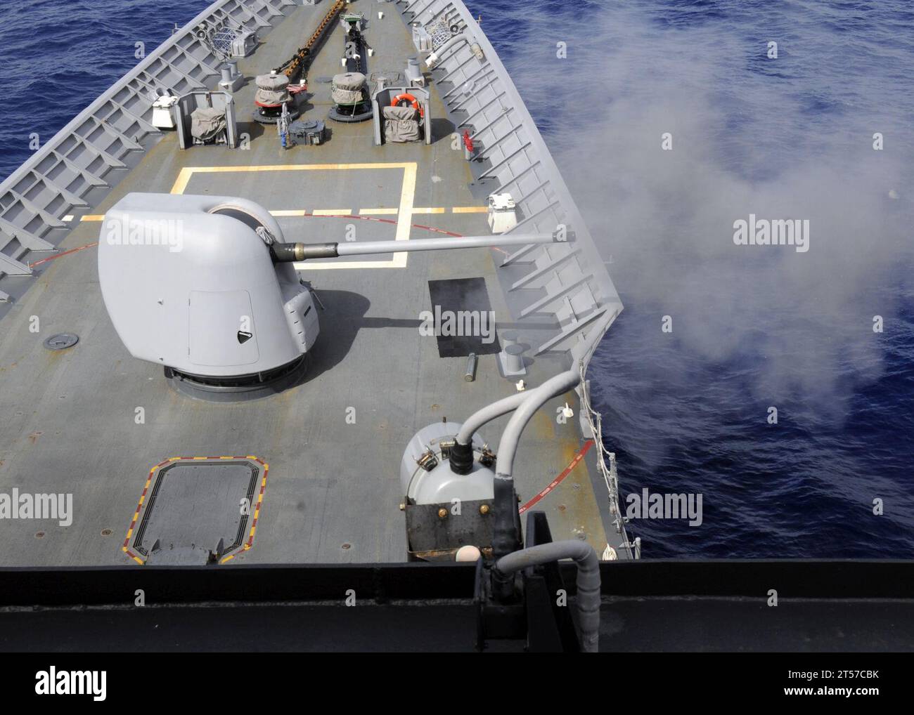 US Navy The Mk-45 5-inch .54-caliber gun is fired from the forecastle ...