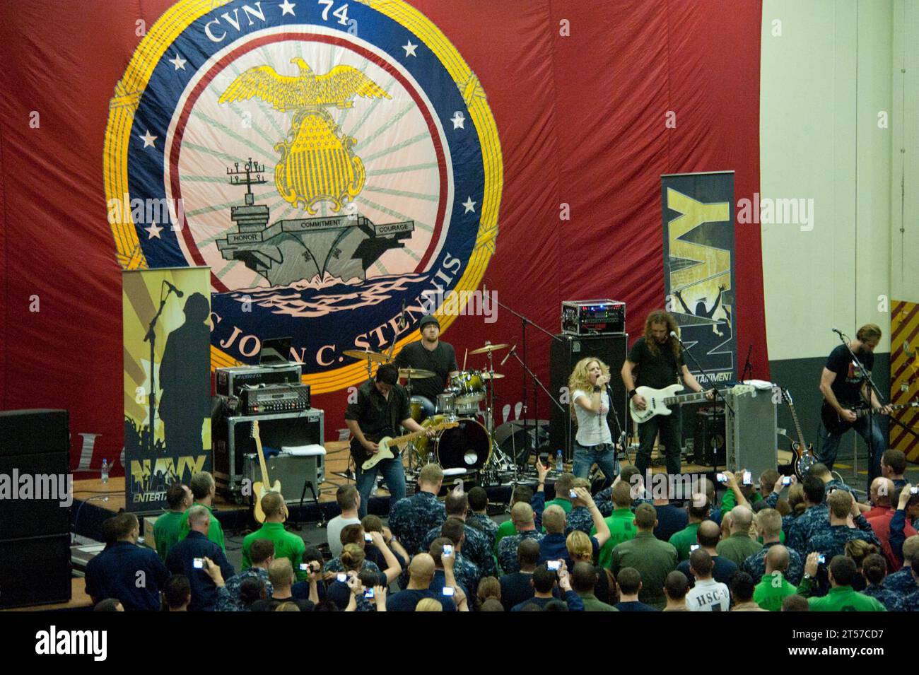 US Navy The Natalie Stovall Band performs for the crew in hangar bay ...