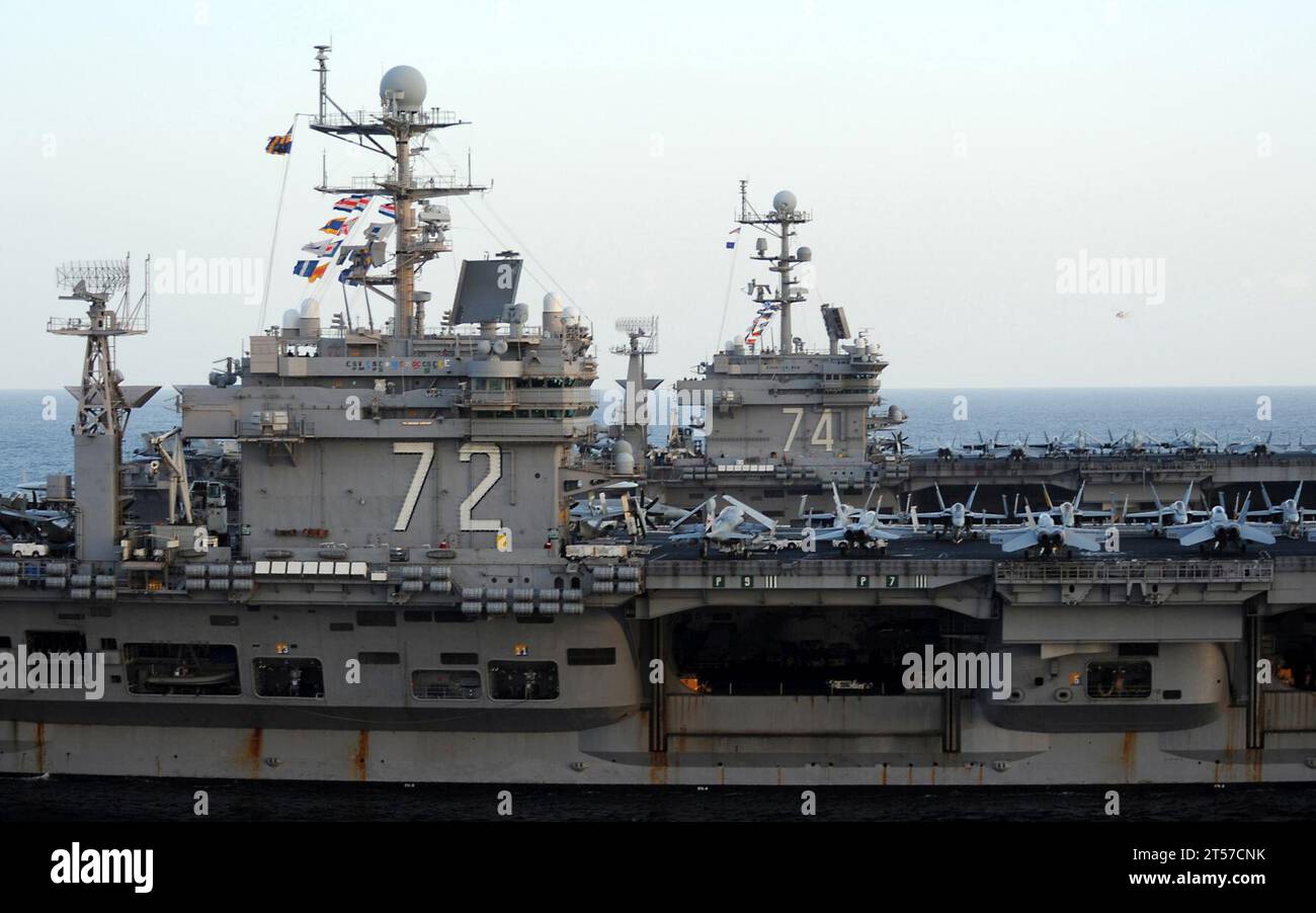 US Navy The Nimitz-class aircraft carriers USS Abraham Lincoln (CVN 72) and USS John C. Stennis ...