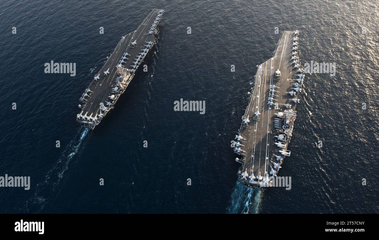 US Navy The Nimitz-class aircraft carriers USS John C. Stennis (CVN 74) and USS Abraham Lincoln ...