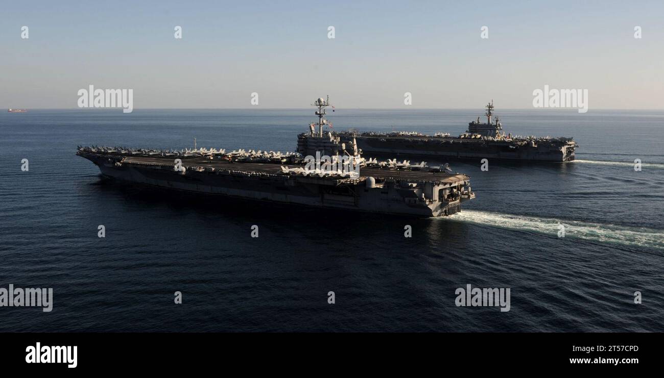 US Navy The Nimitz-class aircraft carriers USS John C. Stennis (CVN 74 ...