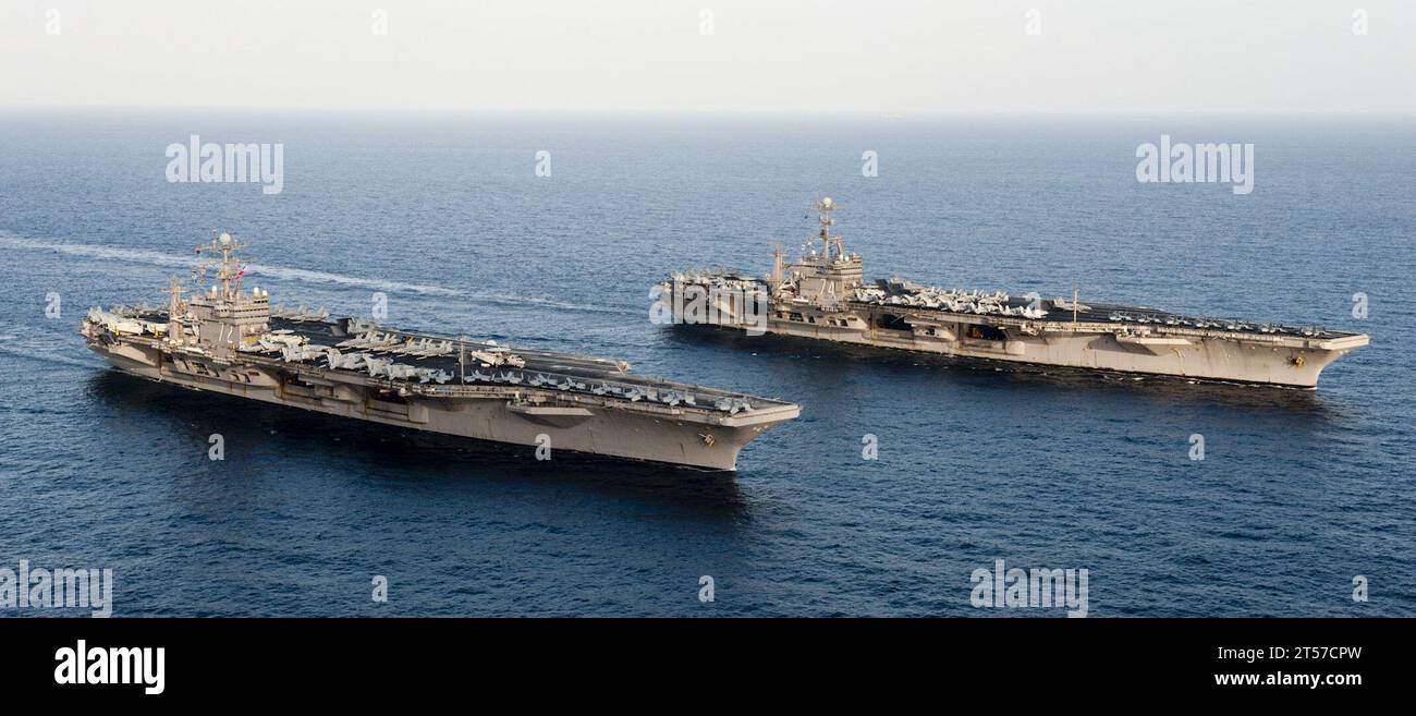 US Navy The Nimitz-class aircraft carriers USS John C. Stennis (CVN 74) and USS Abraham Lincoln ...