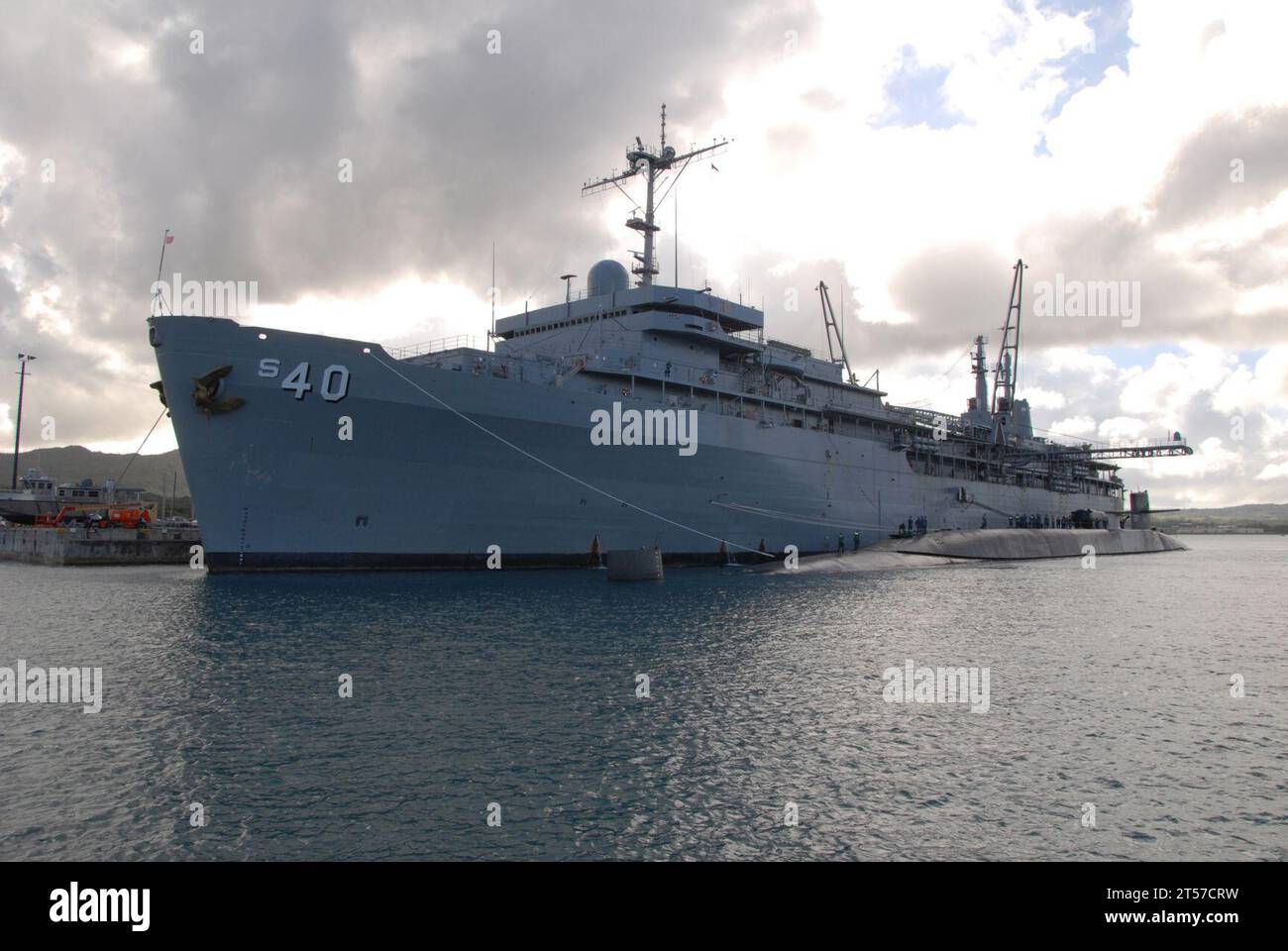 US Navy The Ohio-class guided-missile submarine USS Michigan (SSGN 727) moors alongside the ...