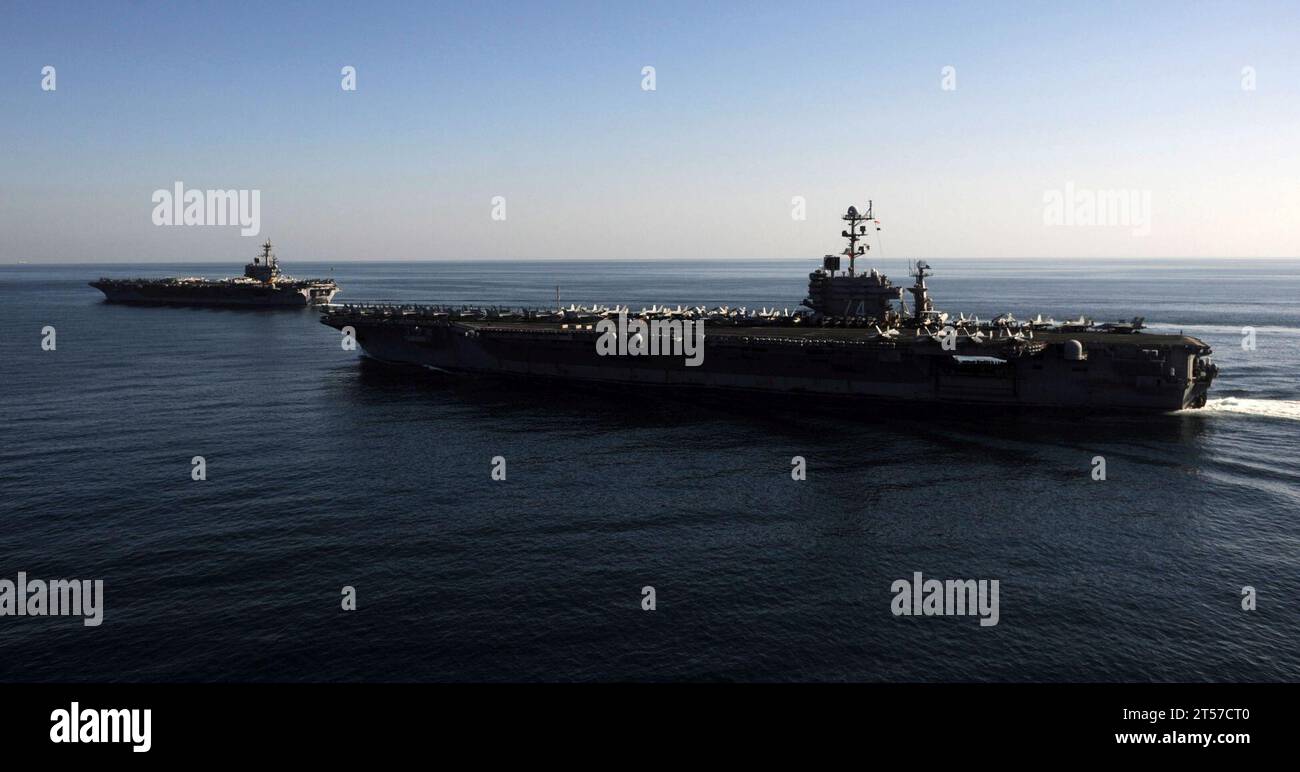 US Navy The Nimitz-class aircraft carriers USS John C. Stennis (CVN 74) and USS George H. W ...