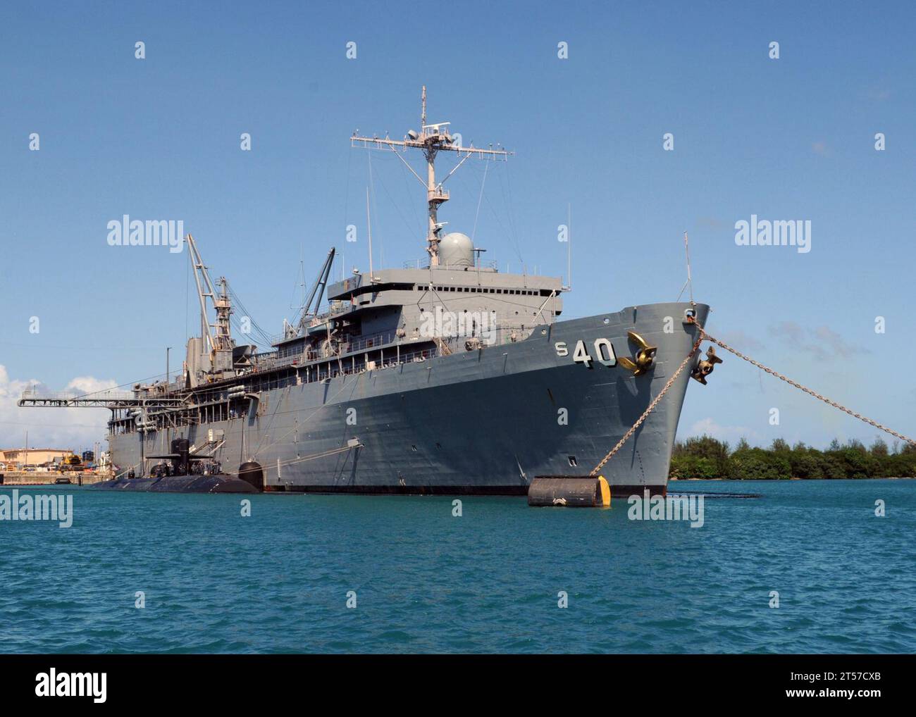 US Navy The submarine tender USS Frank Cable (AS 40) is anchored in ...
