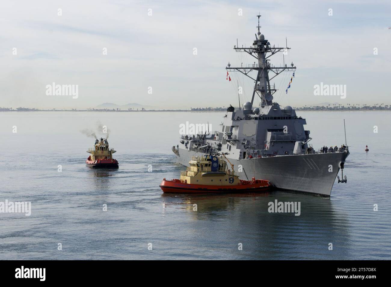 US Navy Tugboats assist the Arleigh Burke-class guided-missile ... US Navy Tugboats assist the Arleigh Burke-class guided-missile ...