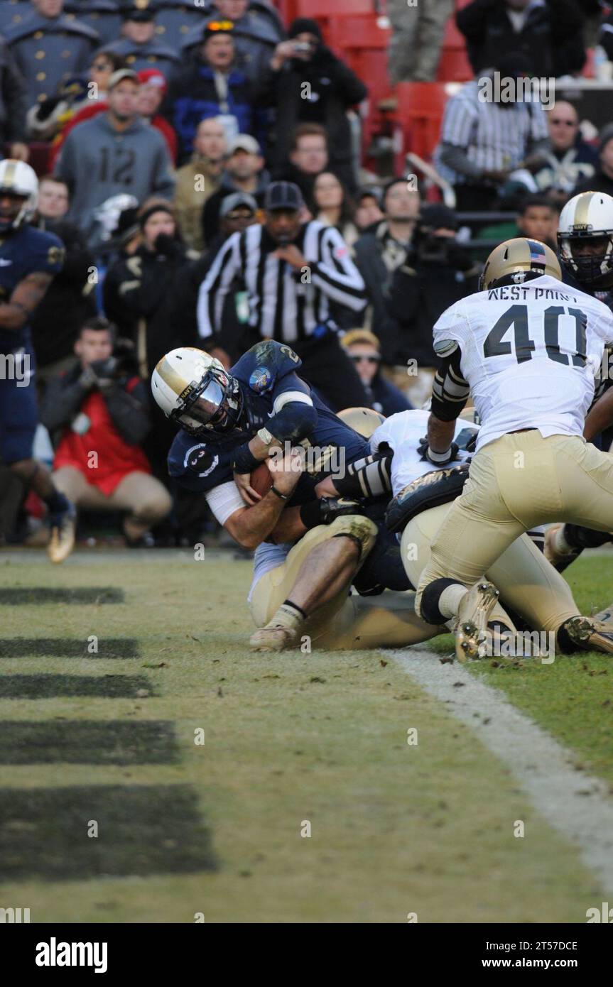 US Navy U.S. Naval Academy quarterback (^2) Kriss Proctor scores a ...