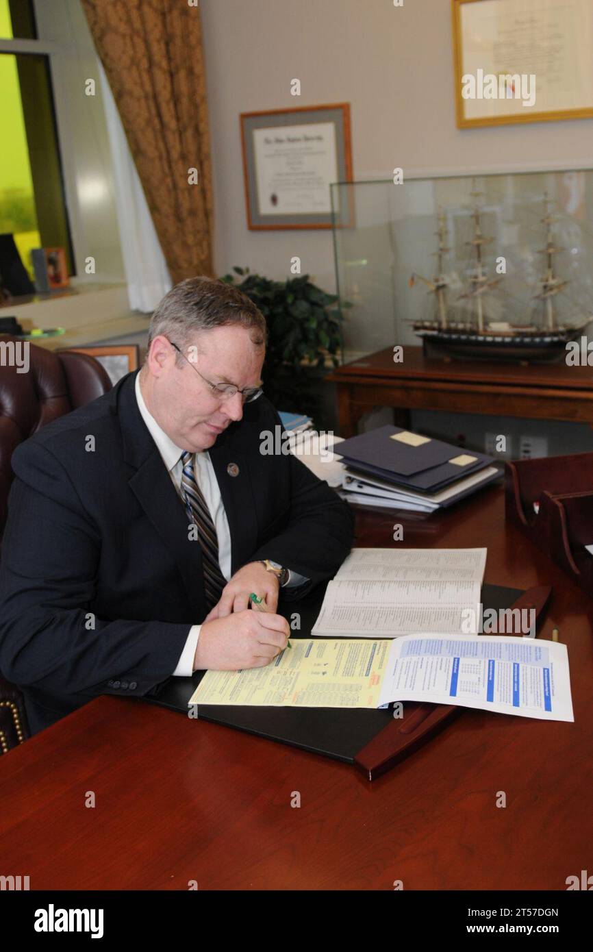 US Navy Under Secretary of the Navy the Honorable Robert O. Work signs ...