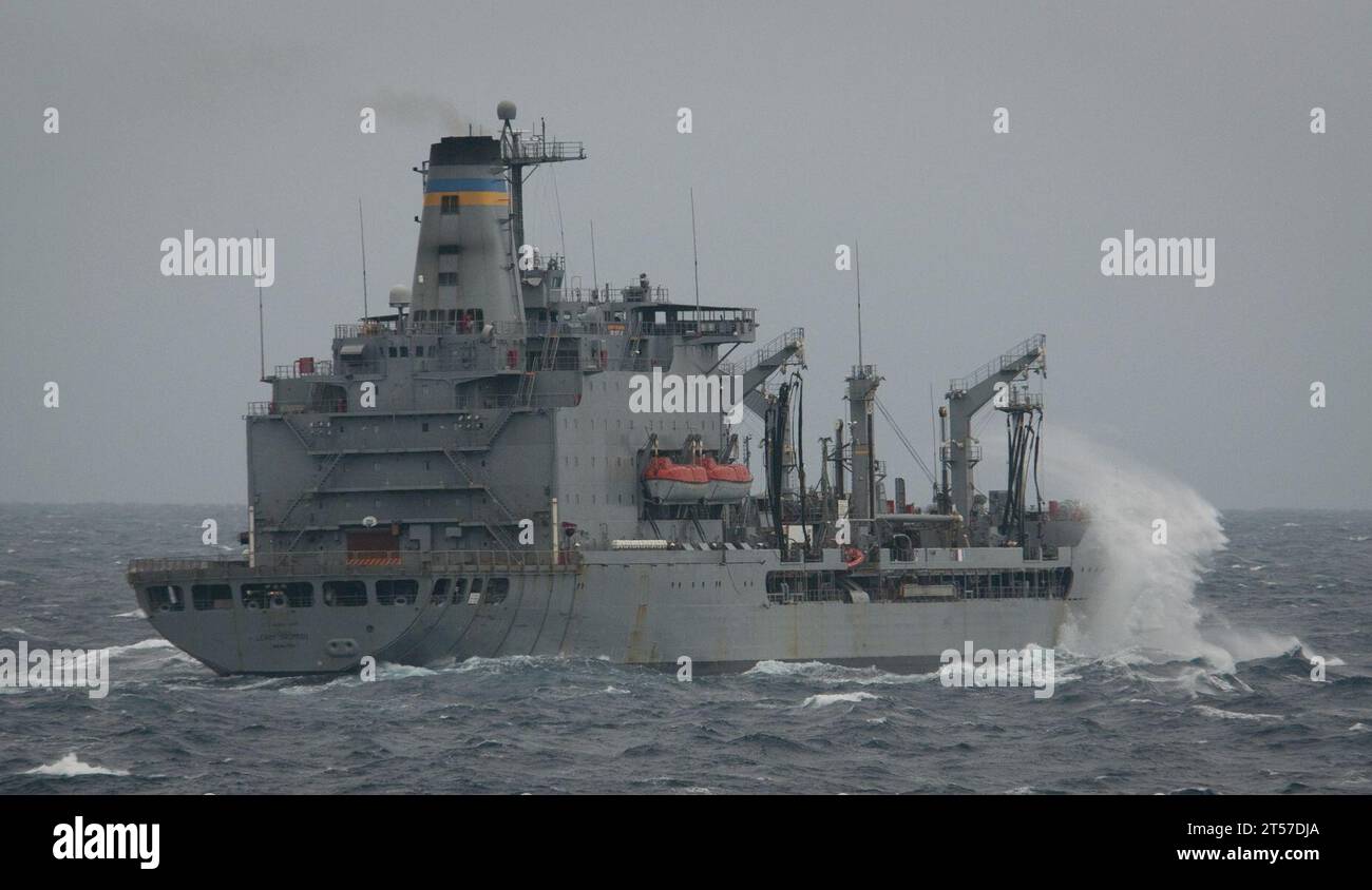 US Navy USNS Leroy Grumman (T-AO 195) is in heavy seas as it prepares ...
