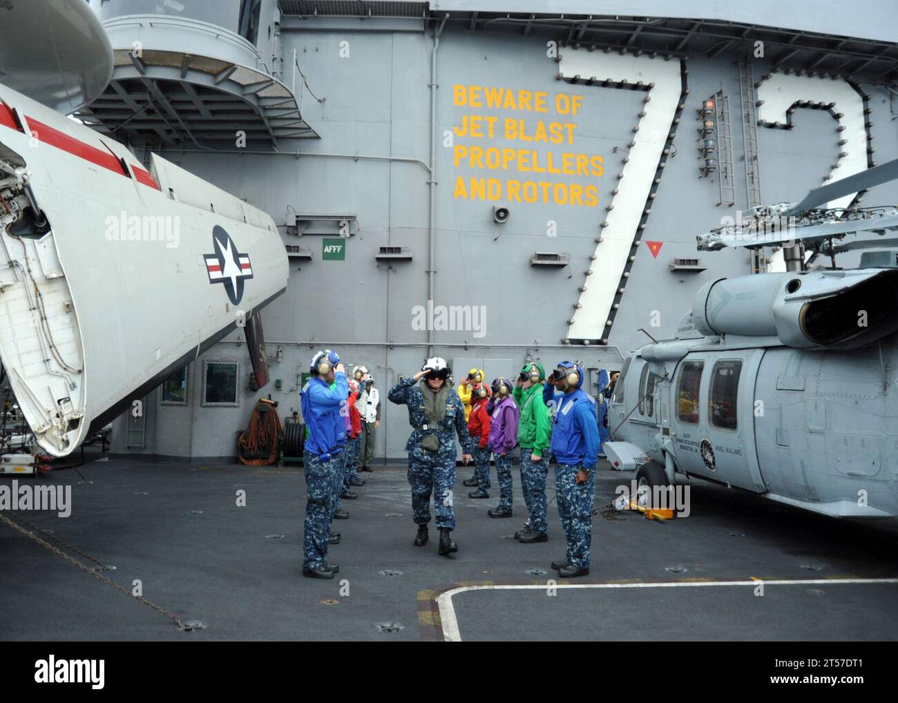 US Navy Vice Adm. Gerald R. Beaman, commander of U.S. 3rd Fleet, passes ...