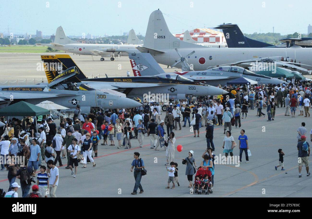 US Navy Visitors view aircraft along the flight line at Naval Air ...