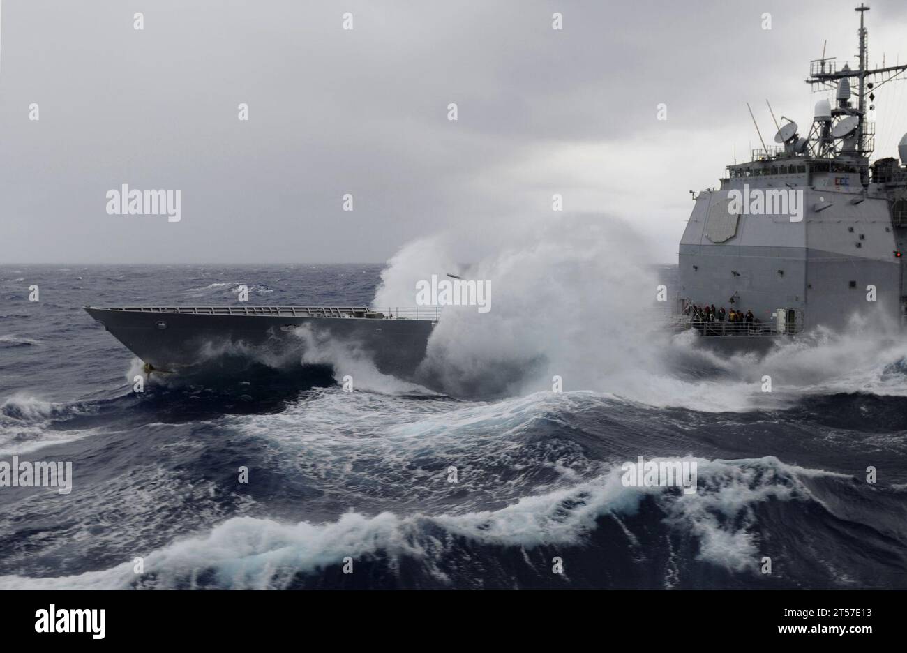 US Navy waves break over the USS Bunker Hill.jpg Stock Photo - Alamy