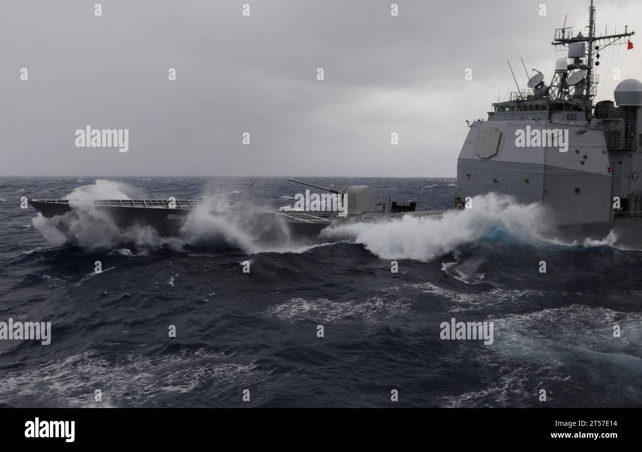 US Navy Waves break over the USS Bunker Hill.jpg Stock Photo - Alamy