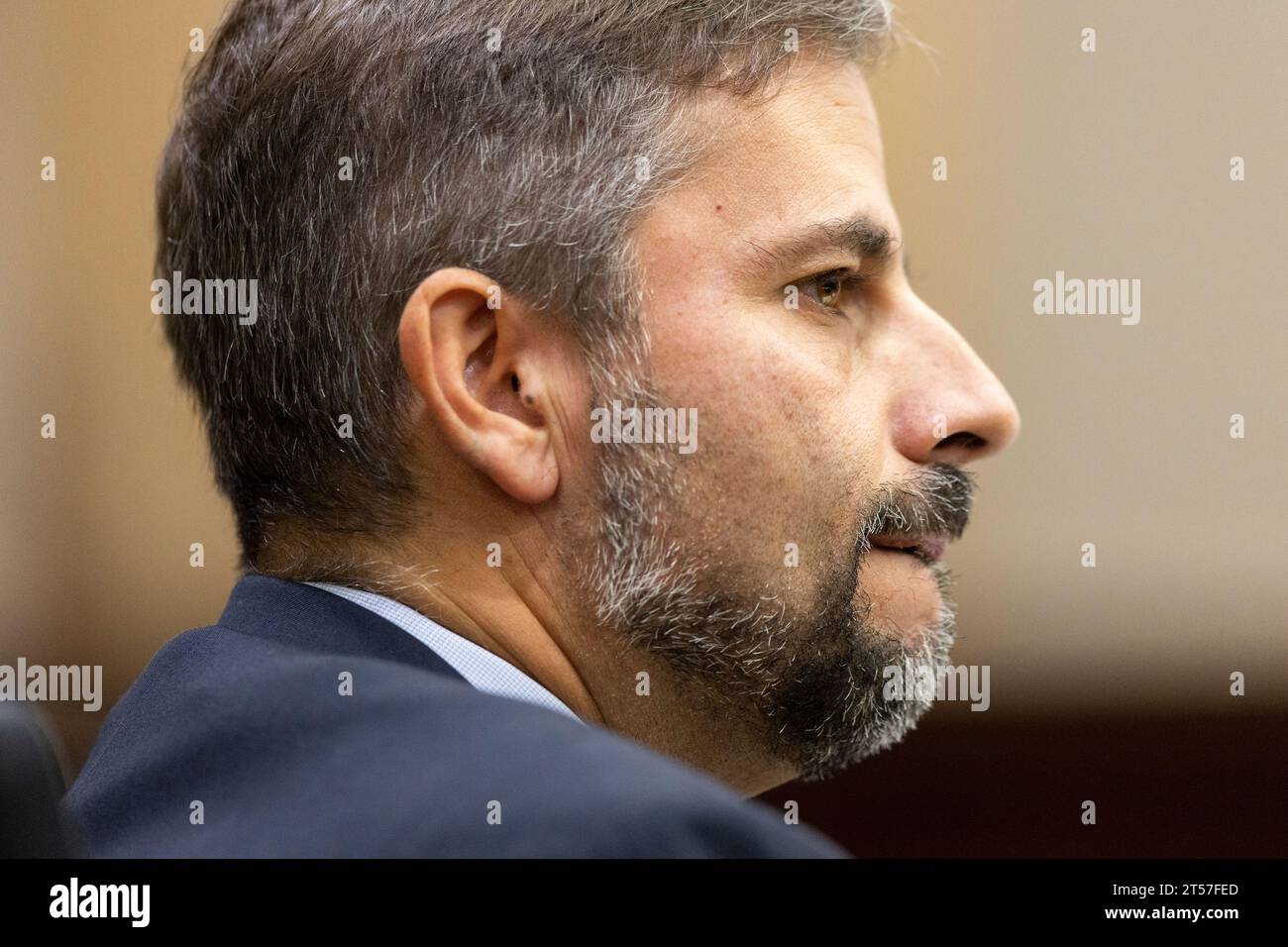 Defense attorney Daniel Rashbaum listens as his client, Charlie Adelson ...