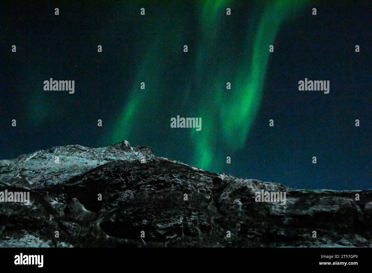 Bright Green Colours of the Northern Light, Aurora Borealis illuminate ...