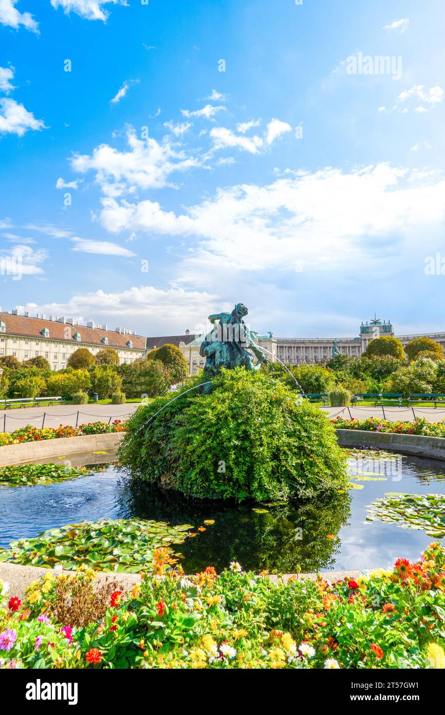 Autumn landscape of the Volksgarten with a view of an ancient marble ...