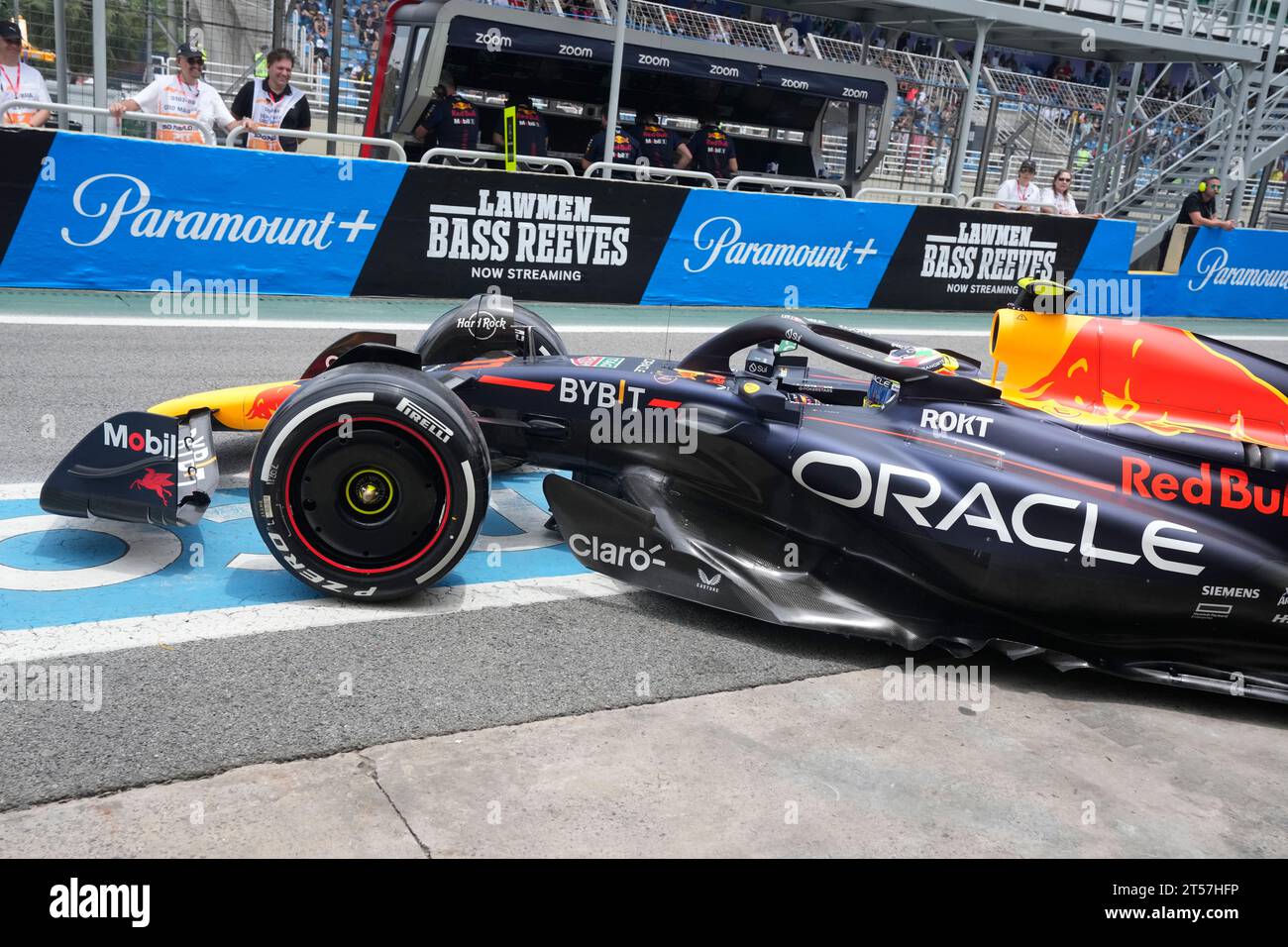 Red Bull driver Sergio Perez, of Mexico, steers his car along the pit lane during a free ...
