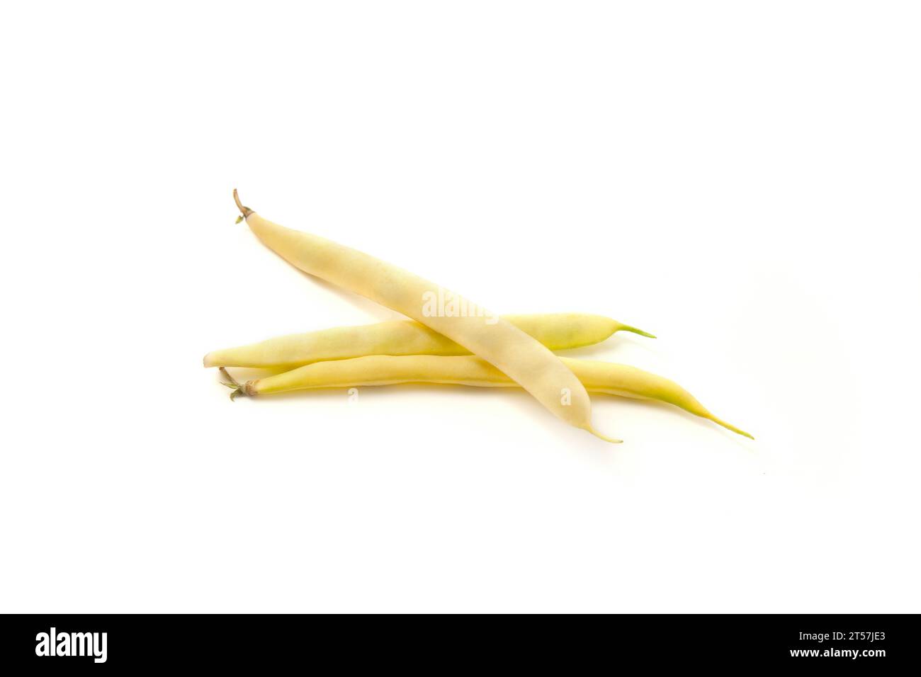 Several pods of raw yellow pods of haricot isolated on white background ...