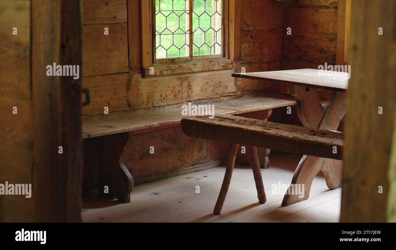 Swiss Chalet interior, close-up of wooden furniture, chair and table ...