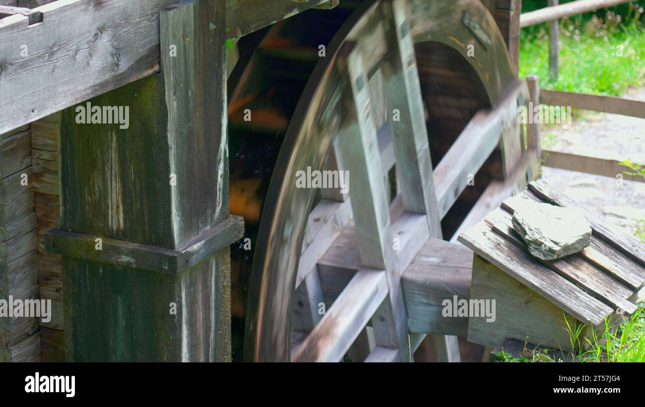 Traditional water wheel in movement in the mill, functional wooden ...