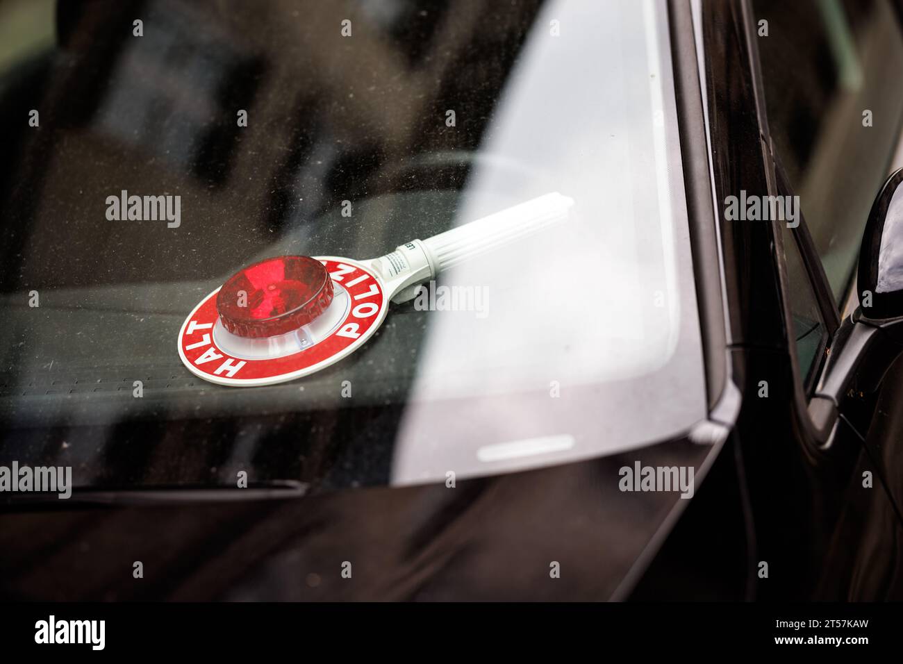 21 July 2023, Bavaria, Munich: A police trowel lies behind the ...