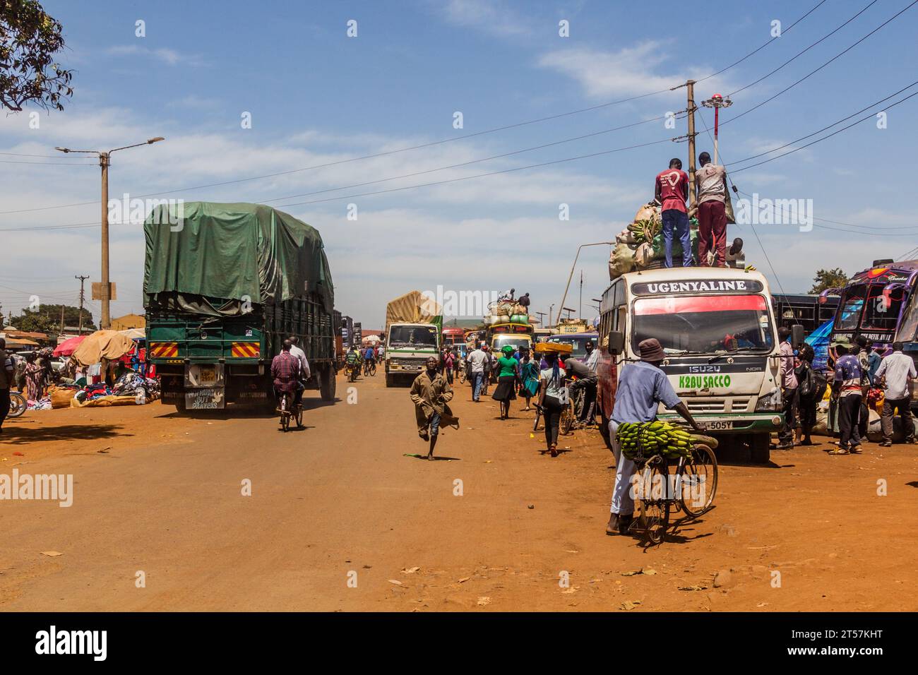 BUSIA, KENYA - FEBRUARY 24, 2020: Various vehicles on the main road to ...