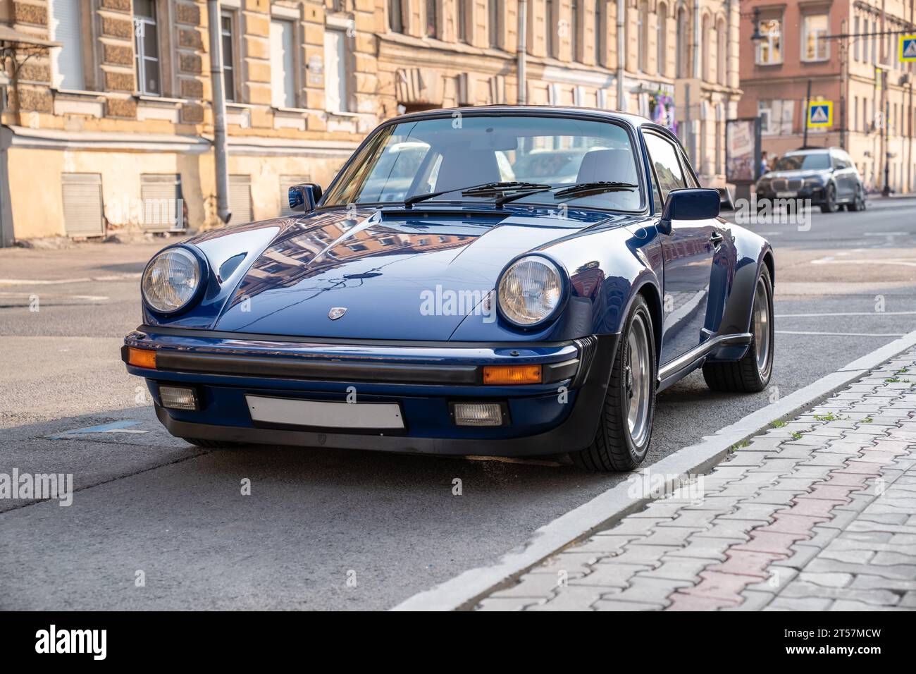 Old retro classic Porsche 911 Carrera car parking on the street Stock ...