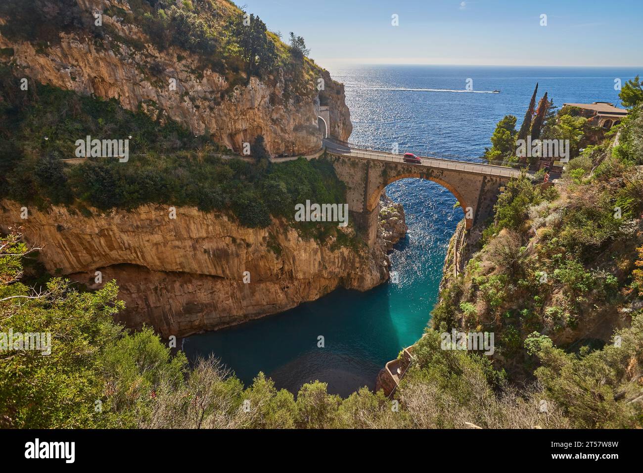 The arched bridge at Fiordo di Furore on the Amalfi coast, Italy on a ...
