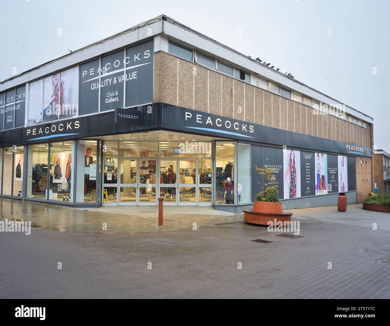 Peacocks shop in the shopping centre of Kettering, England, on a rainy ...