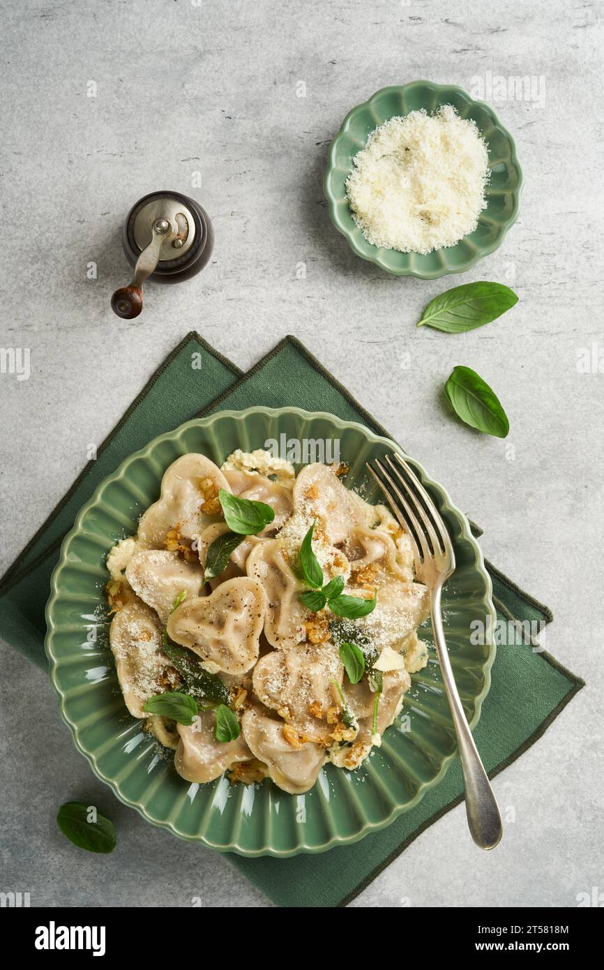 Homemade italian ravioli pasta in heart shape with beef meat, cheese ...