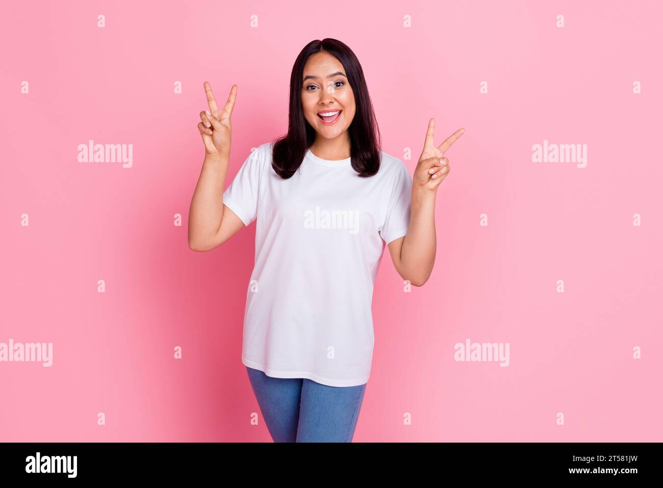 Photo of nice cheerful young happy woman show double v sign congrats ...