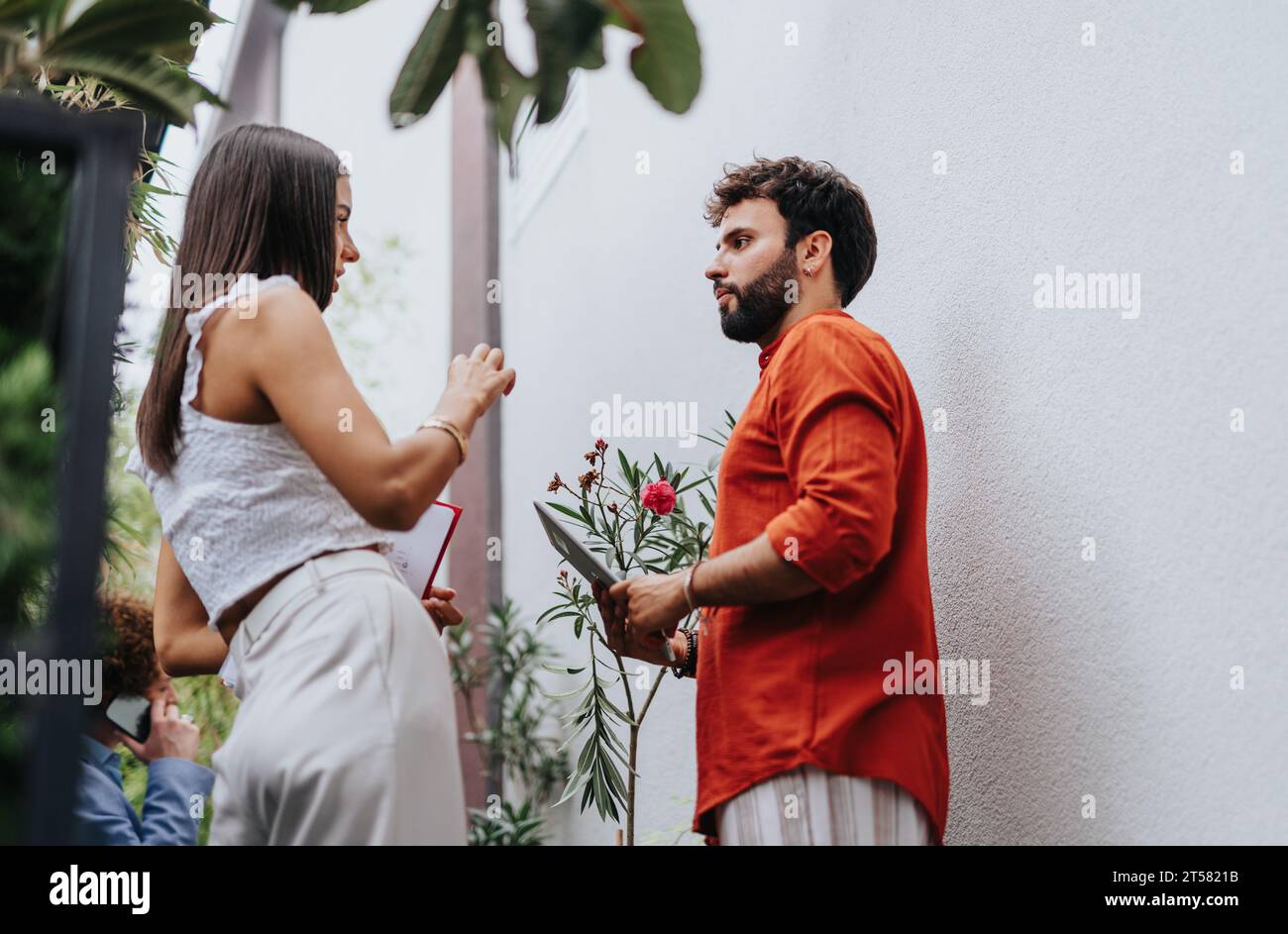 Architects and engineers discuss new project's design and costs. Aesthetic, sustainable, and ...