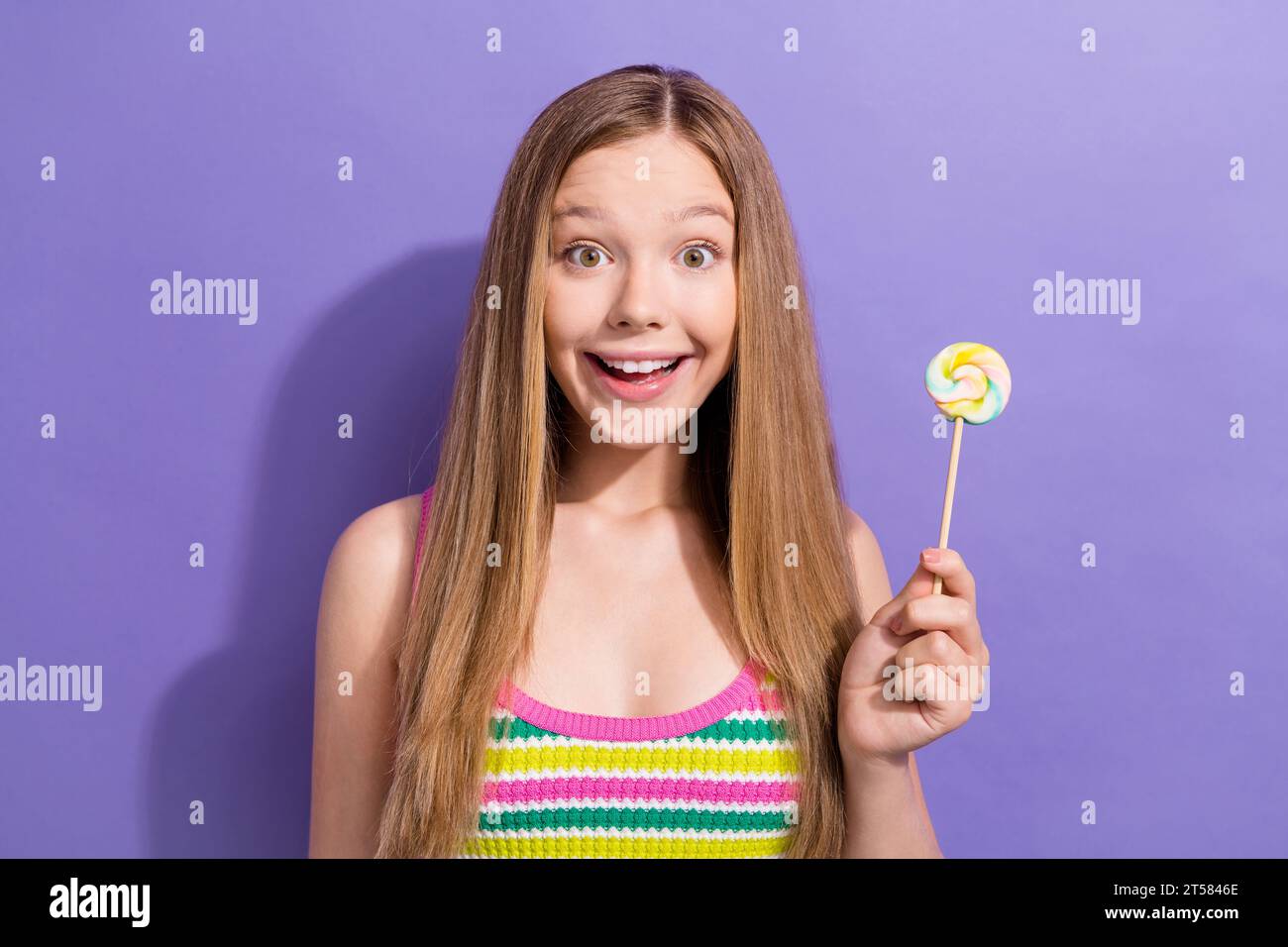Portrait of astonished overjoyed teen girl with long hairstyle wear ...