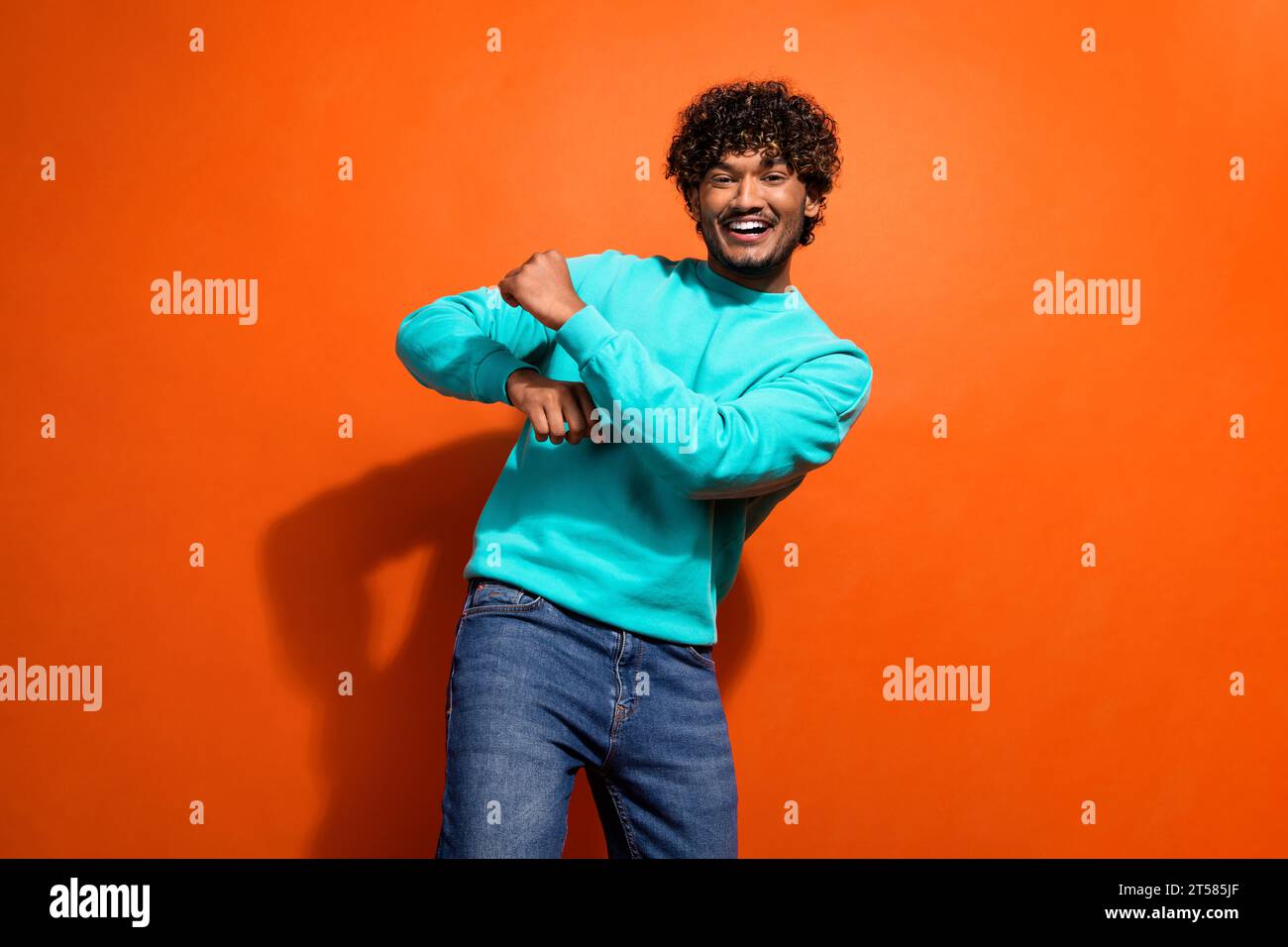 Portrait of cheerful crazy man hands make moves enjoy dancing partying ...