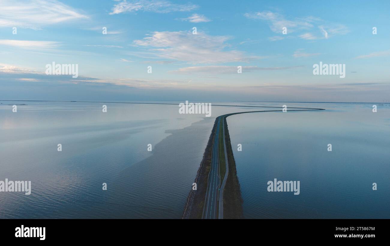 Aerial view of the man-made road through the North Sea to another part of the Northern ...