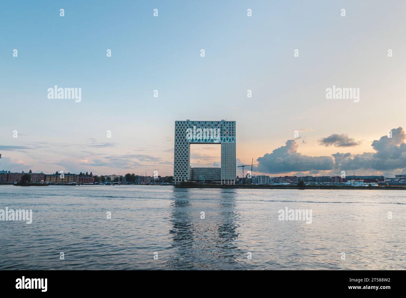 Chair-shaped skyscraper in the harbour of Amsterdam, Netherlands during ...