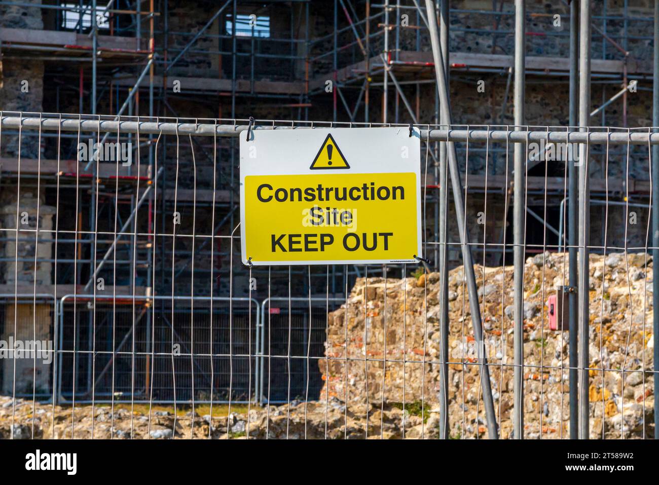 Construction Site Keep Out sign attached to metal fencing on a building ...