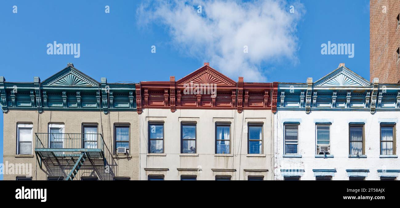 Painted, stamped metal cornices define the roofline of 1477-1481 York ...